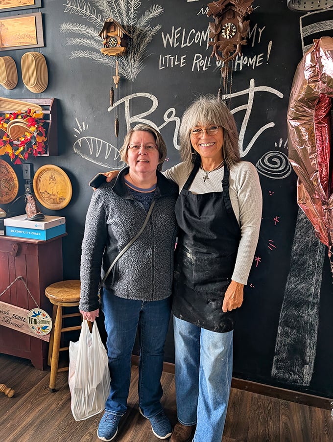 The shop's interior features a traditional cuckoo clock and chalkboard wall—authentic touches that transport you straight to Bavaria.