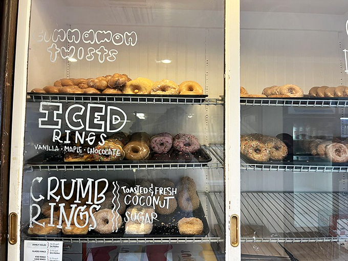 Cinnamon twists, crumb rings, and iced classics—the donut diversity program here deserves a Nobel Peace Prize for bringing people together.