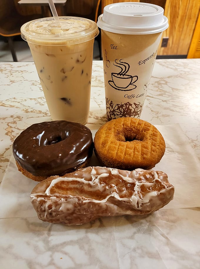 The perfect trio: hot coffee, iced coffee, and donuts. Some relationships are just meant to be, like this delicious threesome.