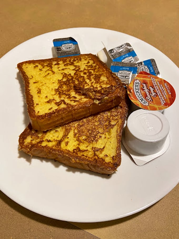 French toast so golden and perfect it makes you wonder if it's what the sun aspires to be when it rises each morning.