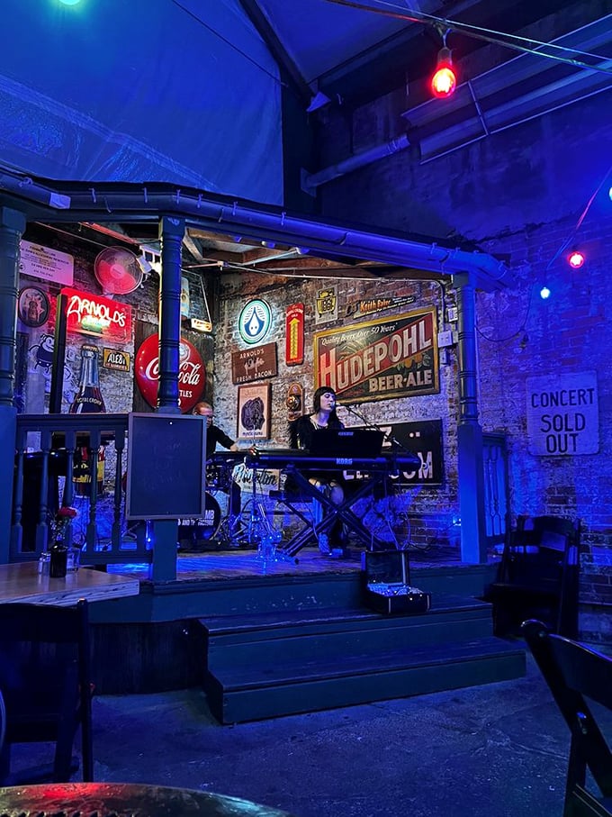 Live music in the courtyard transforms an ordinary evening into the kind of night you'll reference years later—"Remember that time at Arnold's when…"