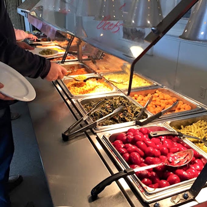 The buffet line—a parade of Southern classics where vegetables somehow taste better than they do anywhere else on earth.