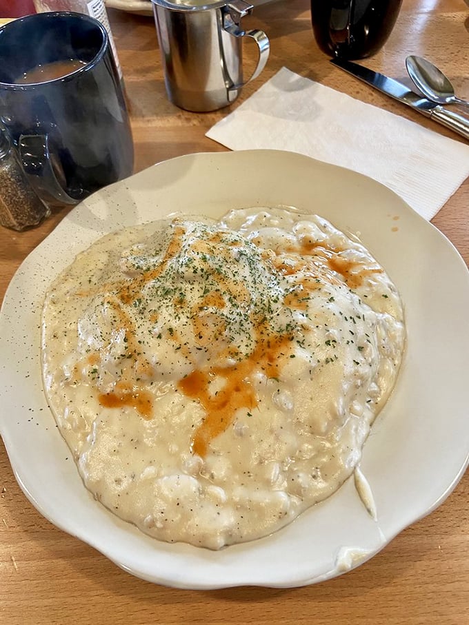 Biscuits and gravy that could make a Southerner nod in approval. That peppery, creamy gravy doesn't just cover the biscuit – it completes it.