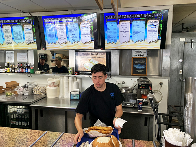 Behind every perfect piece of fish is someone who knows exactly how long "golden brown" takes—down to the second.