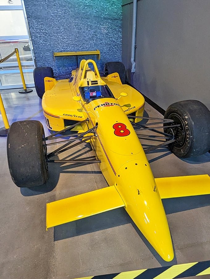This gleaming yellow race car display reminds you that no matter how fast you went today, you're still not quite Indy-ready.