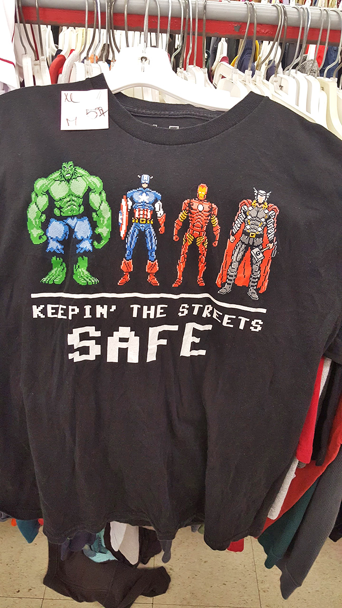 Superheroes "keepin' the streets safe" while keeping your wallet protected too—nostalgic graphic tees for grown-up kids.