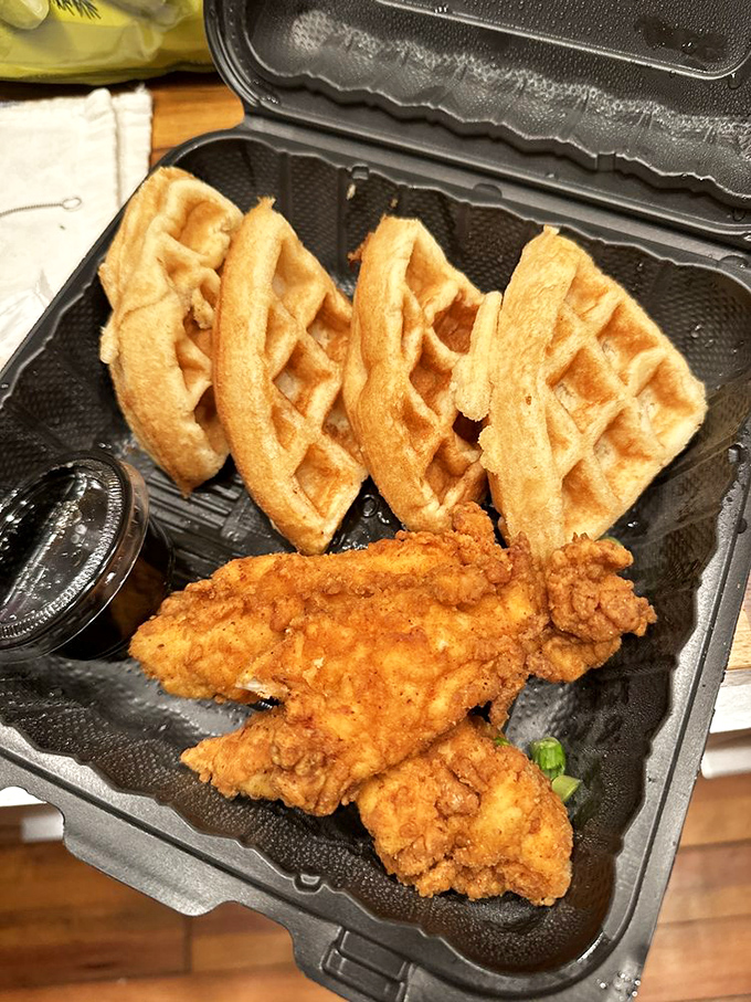 Chicken and waffles: the breakfast equivalent of a power couple, proving that opposites not only attract but create culinary magic together.