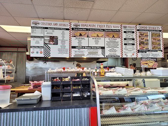 Behind this glass lies a world of possibilities. Like a museum of edible art, each pie waiting for its moment of glory.