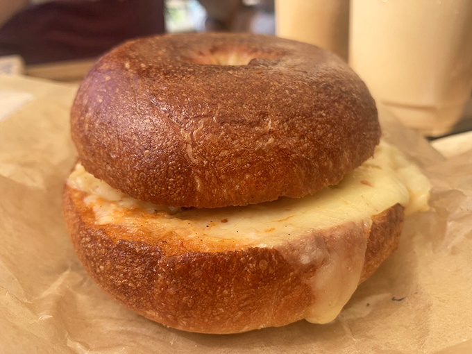 This bagel sandwich isn't messing around—it's what happens when cheese and ham find their perfect bread soulmate.