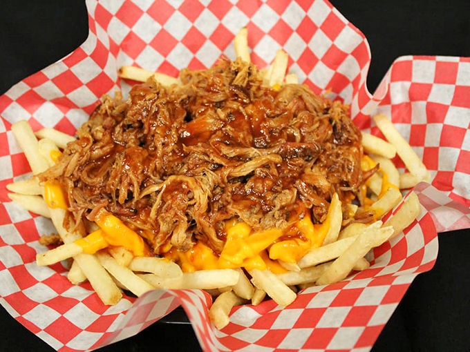 Porky cheese fries that combine two of America's greatest culinary achievements—french fries and pulled pork—in a marriage so perfect it should have its own reality show.