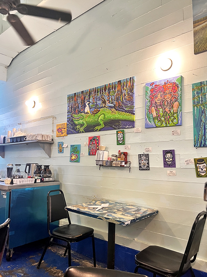 The eclectic art collection transforms simple white walls into a vibrant gallery space – New Orleans culture served alongside your breakfast.