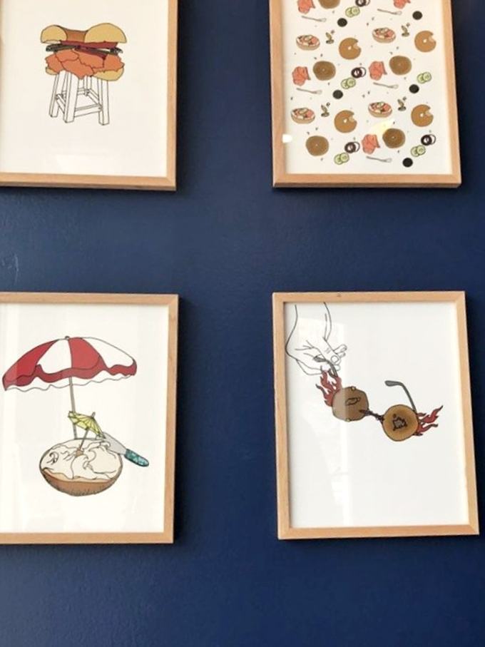 Whimsical bagel art adorns the walls—because when you make food this good, it deserves its own gallery exhibition.