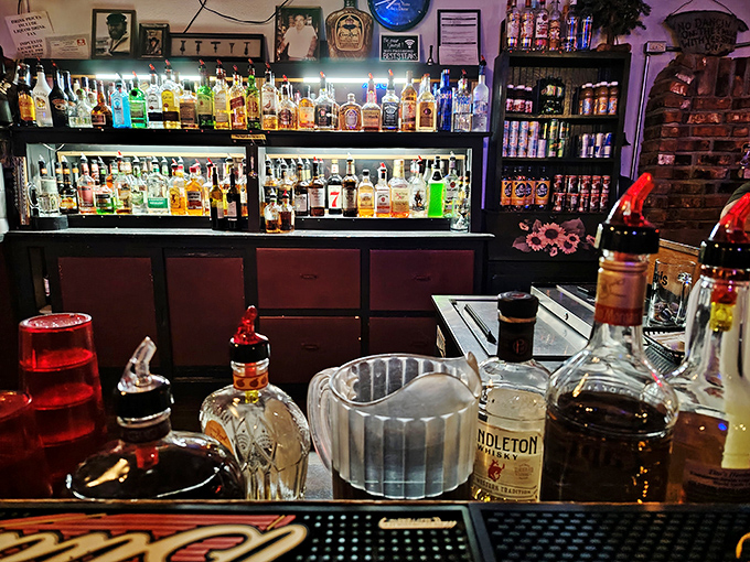 Not a trendy mixology lab, but a proper Kansas bar where the bottles aren't for show – they're working harder than most politicians.