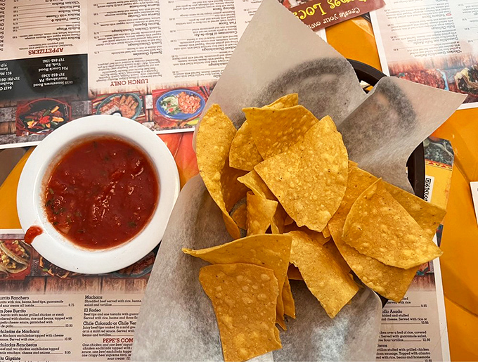 Chips and salsa—the opening act that sometimes steals the show. These golden triangles of corn perfection demand respect and frequent basket refills.