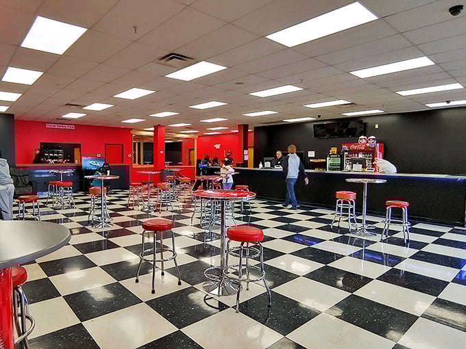Racing memorabilia adorns the walls, transforming post-race snack time into an impromptu museum visit. The trophies watch judgmentally as you order your third soda.