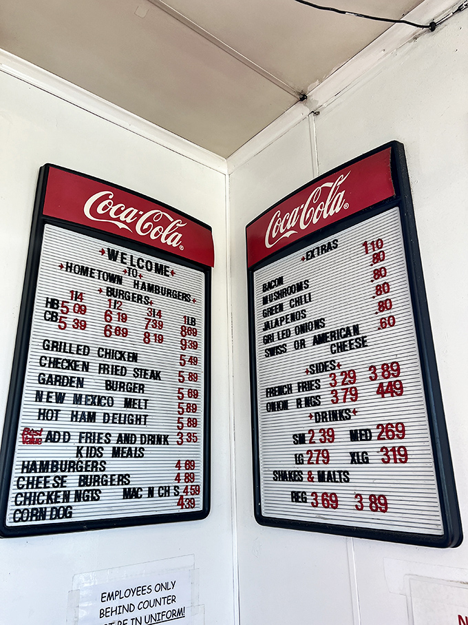 The vintage Coca-Cola menu boards—where the prices might change, but the promise of burger satisfaction remains eternal.