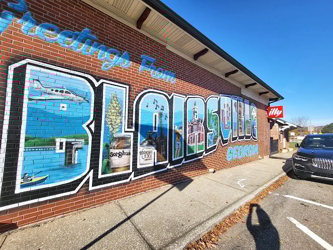 Blairsville announces itself with small-town pride and big-hearted welcome – this mural isn't just art, it's an invitation.