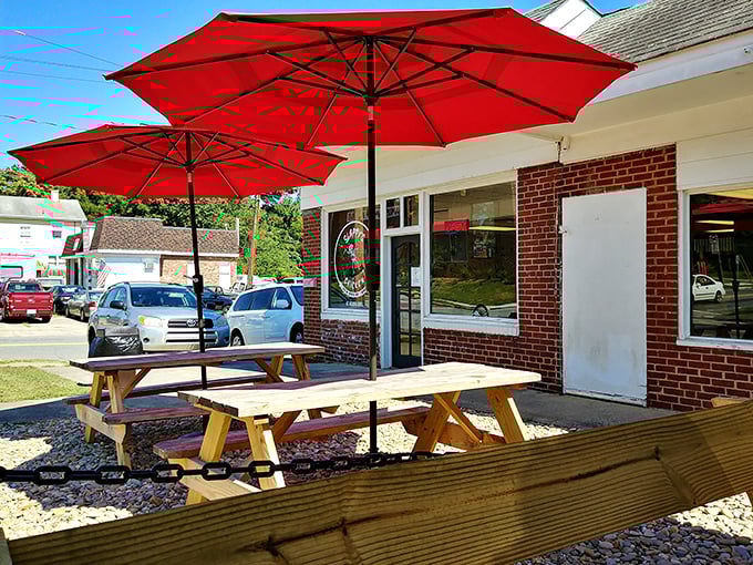 Those red umbrellas aren't just for shade – they're beacons guiding hungry souls to chicken nirvana.