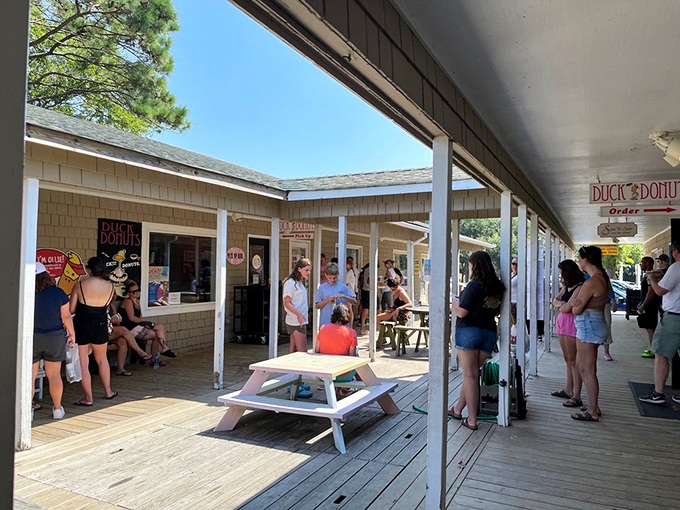The line forms to the right, and nobody's complaining. Vacation patience is directly proportional to the promise of warm donuts.