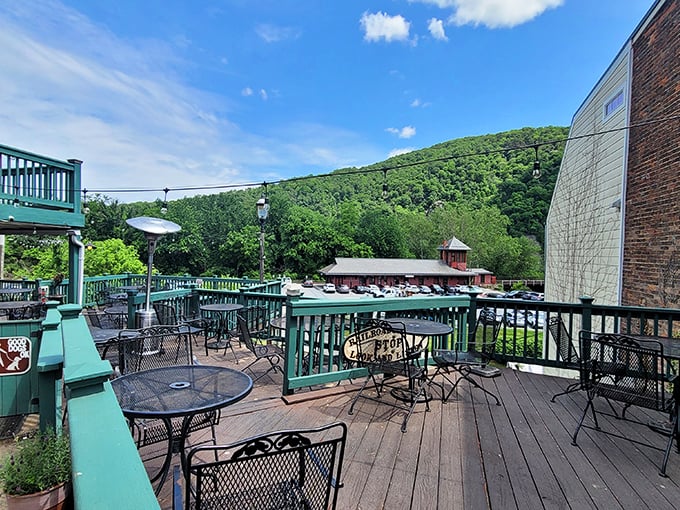 The outdoor deck doesn't just offer seating—it delivers a front-row ticket to the Appalachian mountain show, with fresh air as the appetizer.