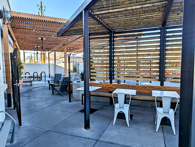 The patio offers wooden slat walls that filter sunlight like nature's own Instagram filter—perfect for enjoying your coffee with a side of vitamin D.