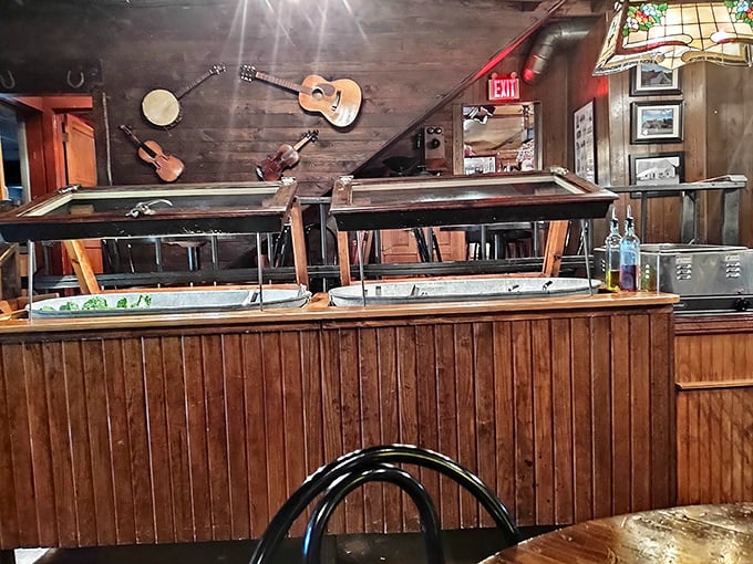 The salad bar setup – where guitars watch over your vegetable selections like musical guardians of freshness.