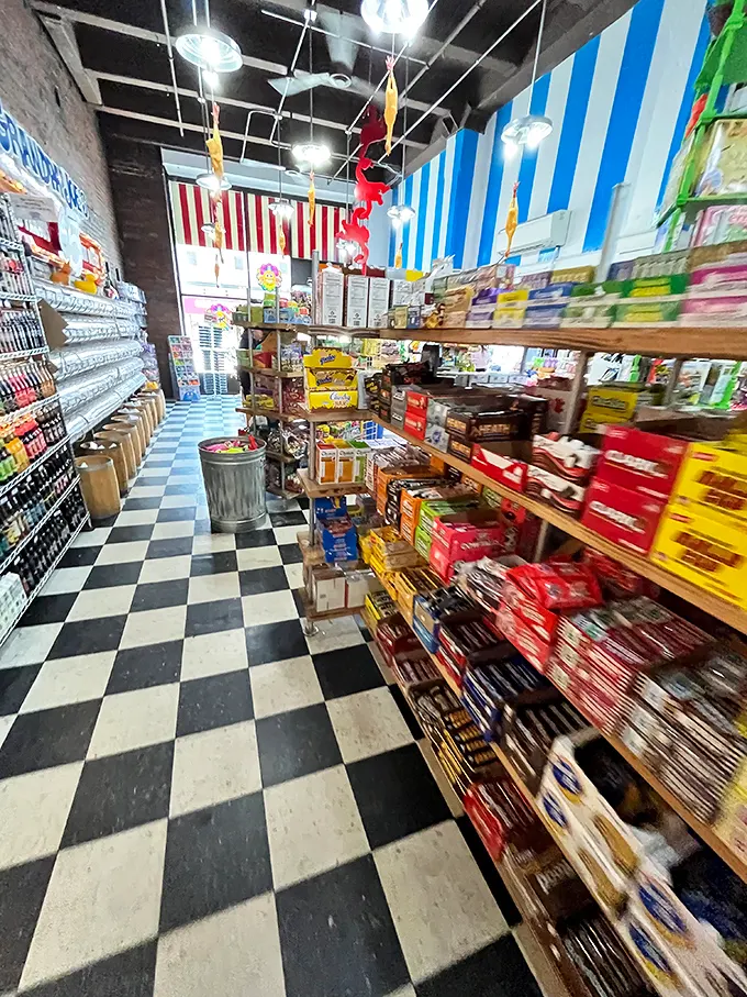 Where blue and white stripes lead your eyes toward infinity—or at least toward more candy than you thought possible under one roof.