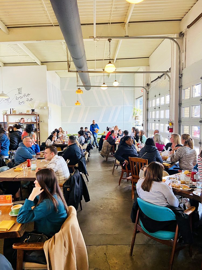 The weekend crowd proves the universal truth: people will wake up early for exceptional food. The diverse diners share one common trait—the look of anticipation.