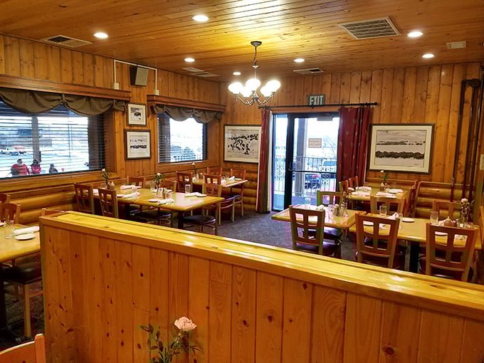 A dining room where memories are made between bites of prime rib. Wood paneling never went out of style here—it never had to.