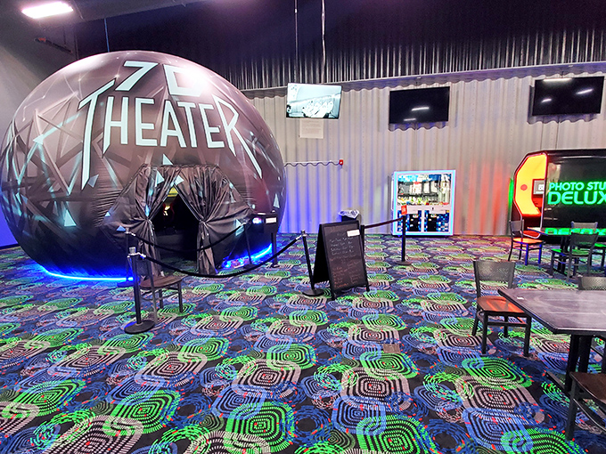 The 7D Theater—where dimensions seven through ten apparently involve sitting in a sphere and having your mind thoroughly blown.