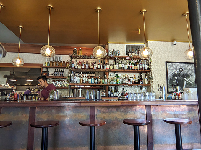 The bar isn't just stocked—it's an arsenal of spirits ready to be transformed into Southern classics with Pacific Northwest twists.