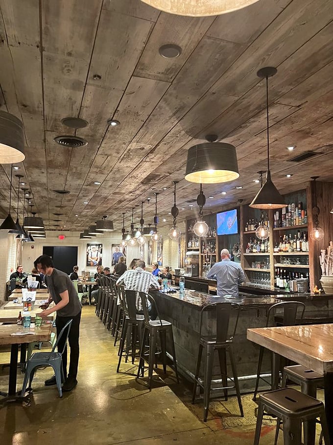 The bustling interior hums with the sound of happy diners—proof that word has definitely gotten out about this seafood sanctuary.