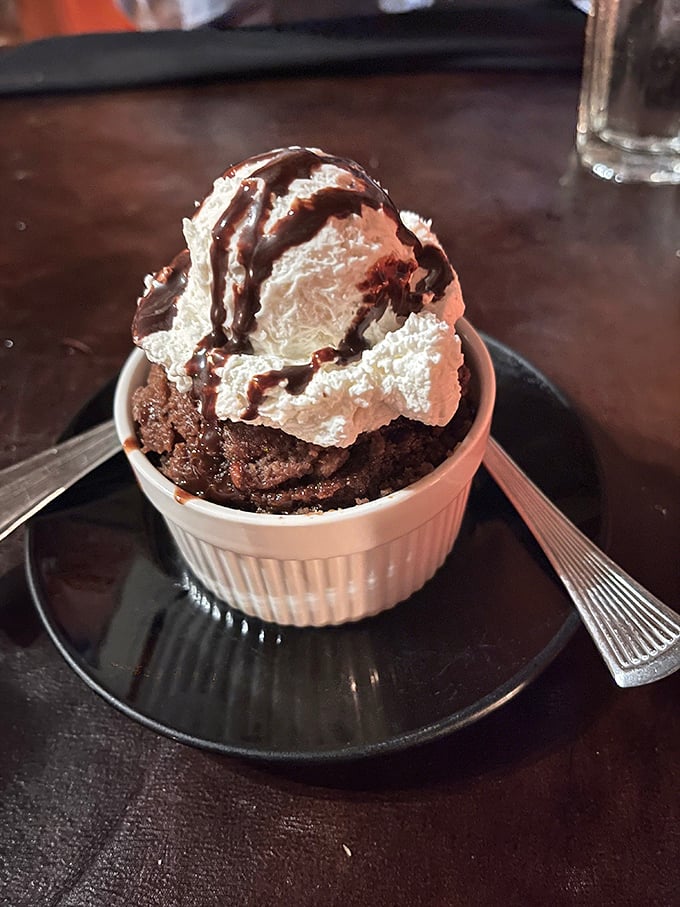 This chocolate dessert with whipped cream isn't just the final act—it's the encore that brings the house down. Sweet perfection.