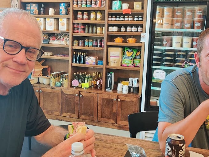 The look of a man who's just discovered that happiness can indeed be purchased—and it comes between two slices of bread.