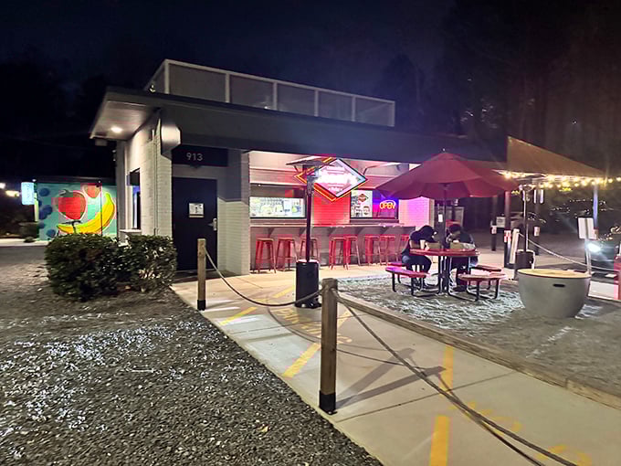 As day turns to evening, Cheat's transforms into a beacon for the hungry, its red-lit logo promising satisfaction to night owls and dinner-seekers alike.