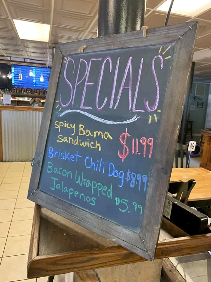 This specials board isn't just announcing food—it's revealing today's opportunities for joy. That Spicy Bama Sandwich is practically begging for attention.