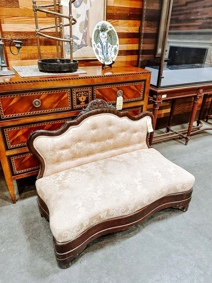 This elegant settee and inlaid dresser pairing is the furniture equivalent of finding vintage Chanel at a yard sale—sophisticated history at a fraction of new prices.