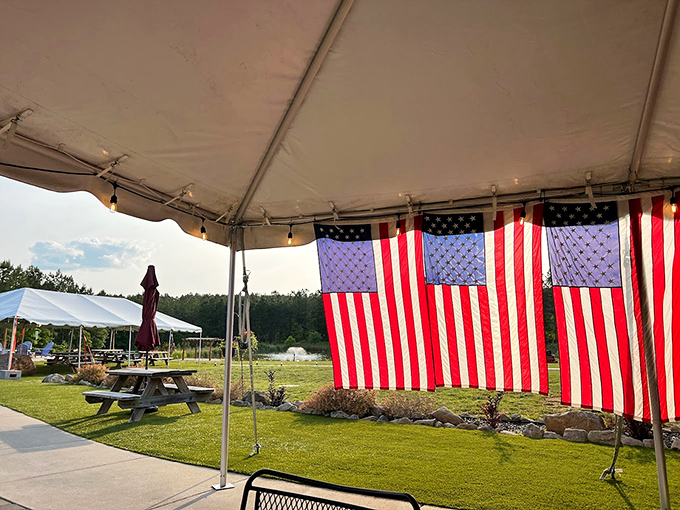 American flags flutter in the breeze as if to say, "This, my friends, is what we mean by amber waves of grain-fed beef."
