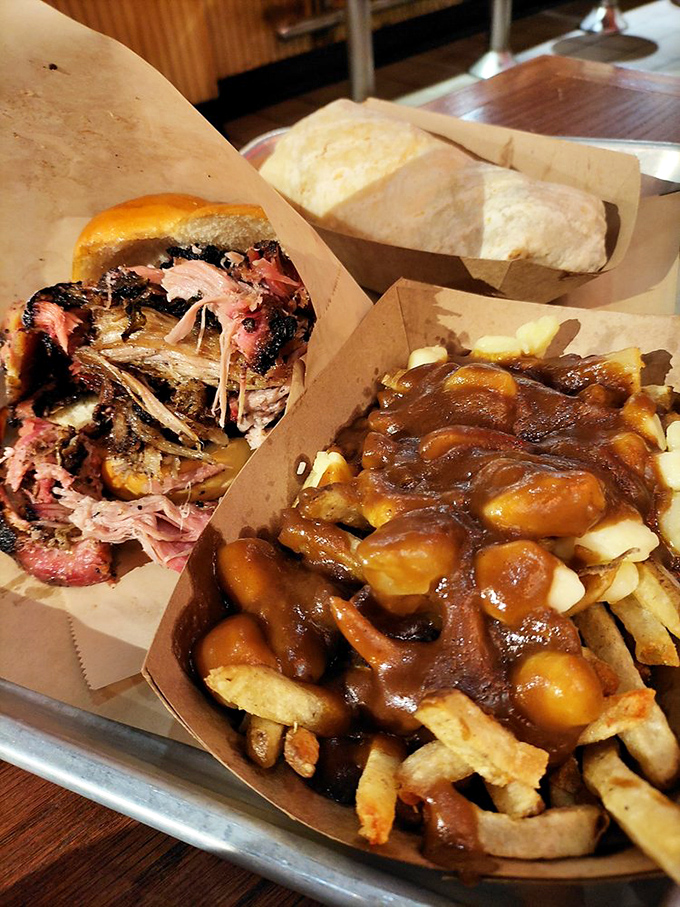 Poutine gets the smokehouse treatment. French fries swimming in gravy with a pulled pork sidekick—a beautiful international alliance.