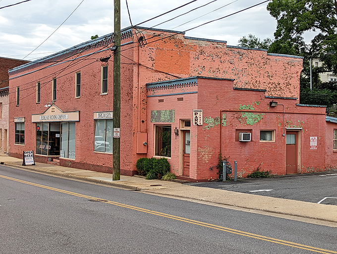 This unassuming red brick building houses Redbeard Brewing Company, where craft beer enthusiasts gather to debate hops with the intensity of philosophy professors.