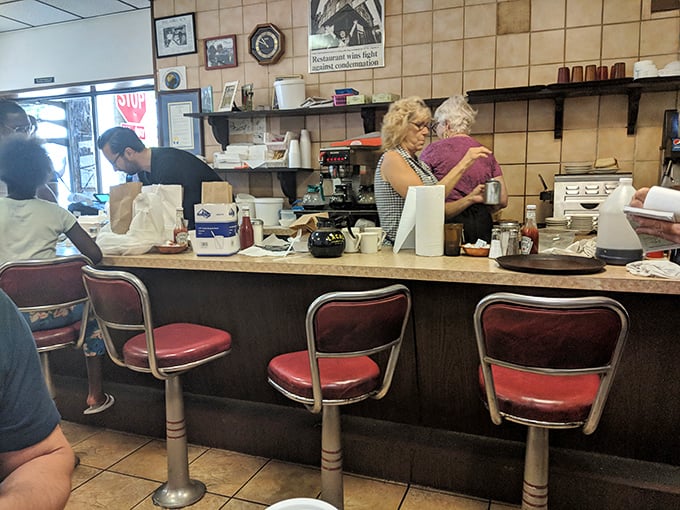 Where breakfast magic happens. The counter seating offers front-row tickets to the morning show—complete with coffee refills and local gossip.