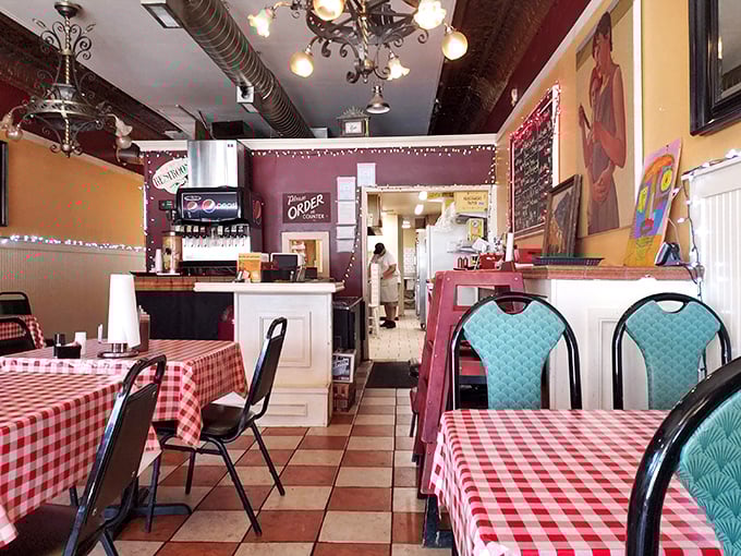 The interior speaks to barbecue's honest soul—red-checkered tablecloths and simple decor let the food do all the talking.