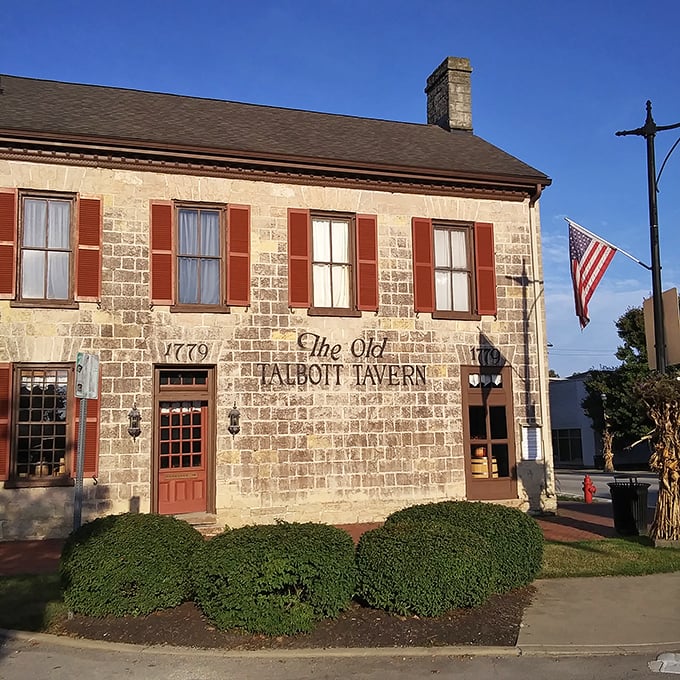 The Old Talbott Tavern has been serving weary travelers since 1779, its limestone walls holding secrets of American history and legendary guests.