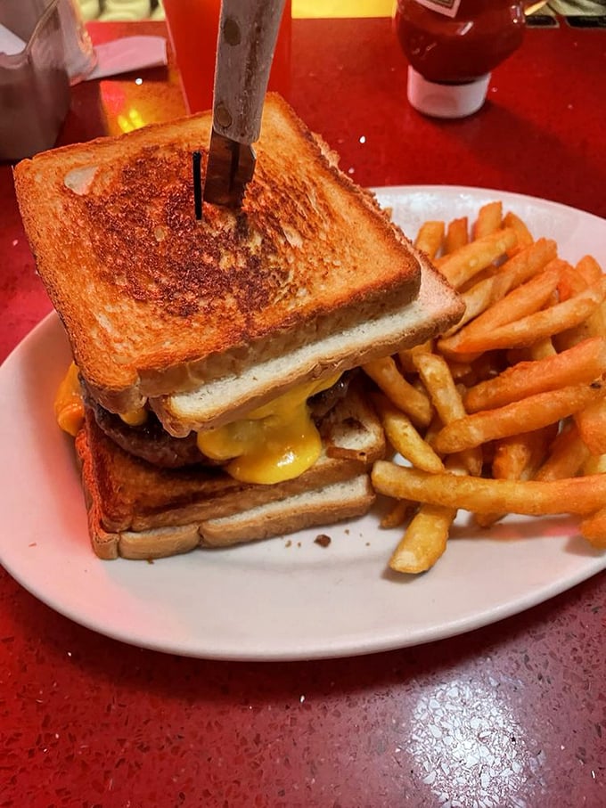 This isn't just a grilled cheese sandwich—it's a masterclass in butter-crisped perfection with molten American cheese threatening joyful escape.