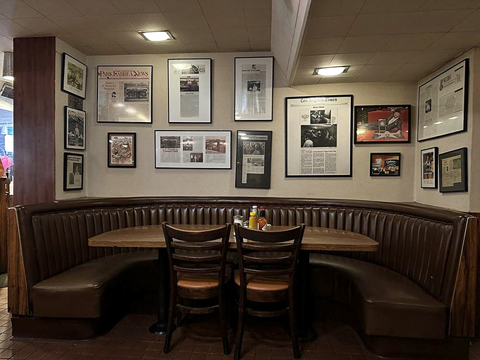 The wall of fame where newspaper clippings tell stories of celebrity sightings and sandwich pilgrimages. Every booth has hosted someone's perfect meal or important conversation.