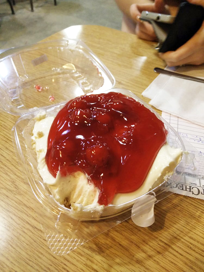 This cherry-topped cheesecake isn't just dessert—it's edible art. The kind of sweet finale that makes you contemplate ordering seconds.