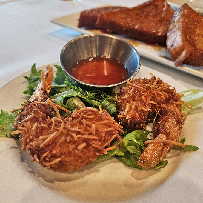 Coconut shrimp that actually taste like both coconut AND shrimp – a culinary miracle that deserves more recognition than whatever won Best Picture last year.