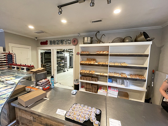 The counter where magic happens daily. That "just baked" aroma isn't a candle scent—it's the real deal wafting from the kitchen.