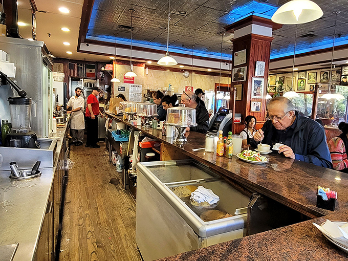 Where the magic happens—the counter seating offers front-row views of short-order choreography that would impress even Broadway directors.