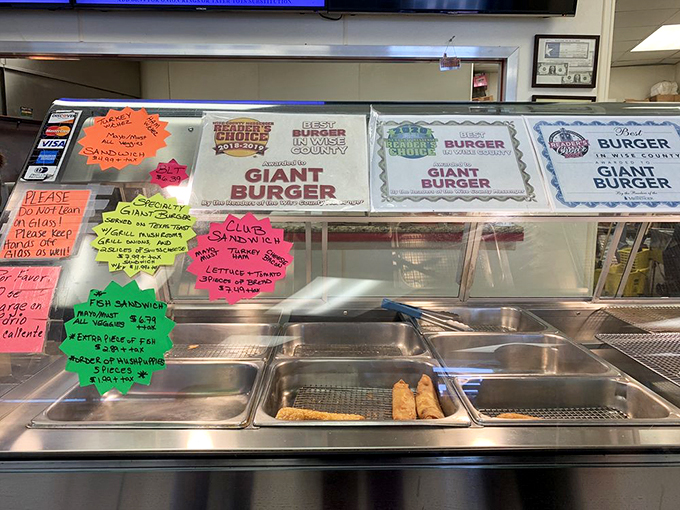 The display case and handwritten specials—a roadside diner's version of fine art that speaks to the stomach.